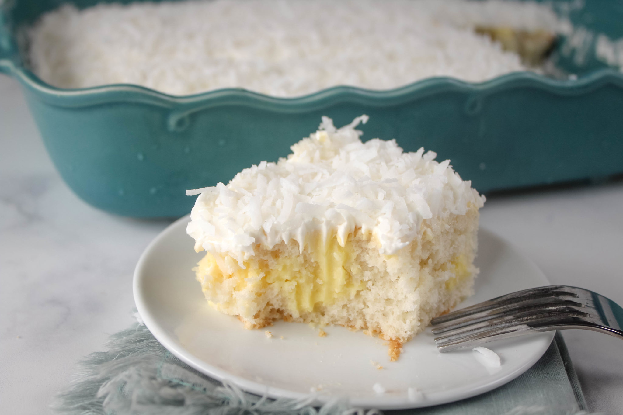Coconut Poke Cake - Baked Broiled and Basted